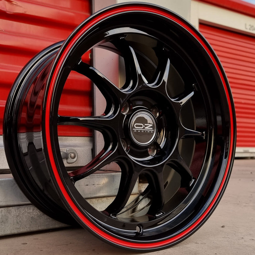 SET DE LLANTAS OZ. Aro 15-4x100 .Color Negro Brillante Linea Roja .(15 ...
